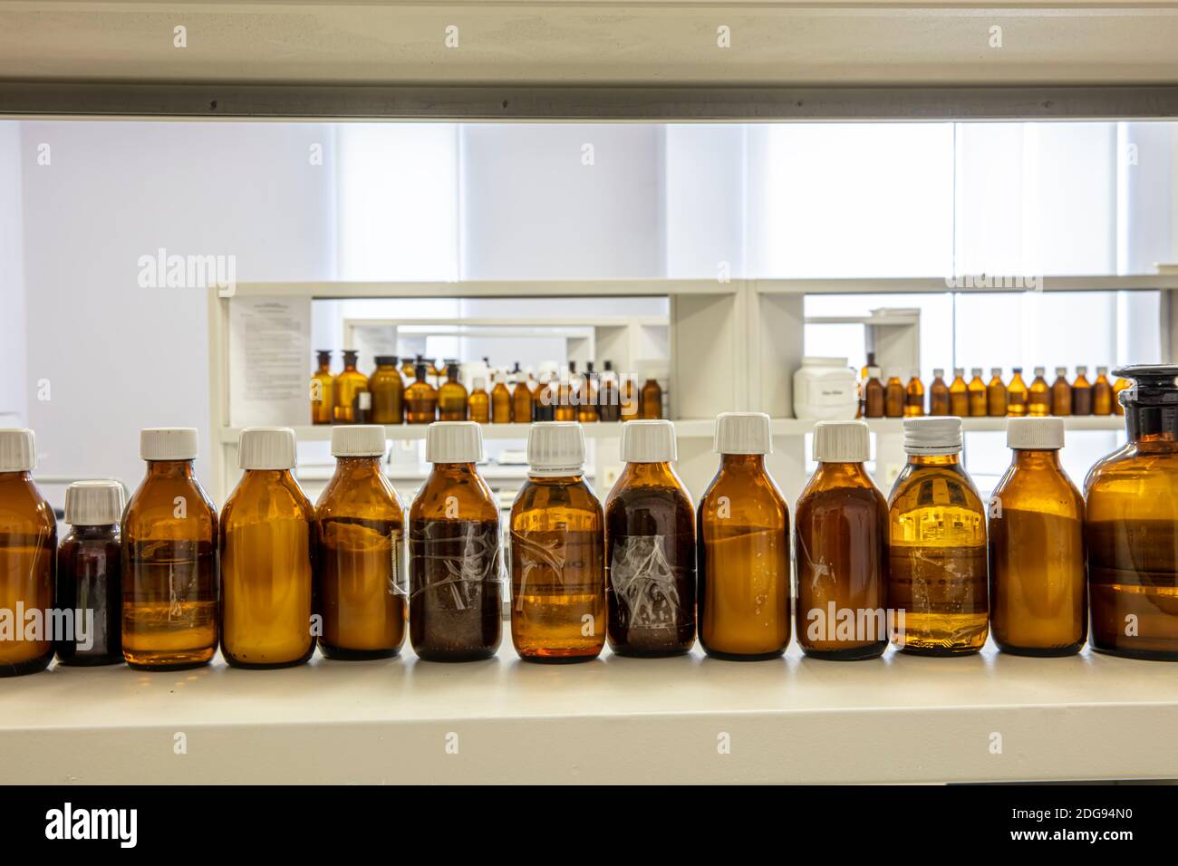 Close up amber color bottles in laboratory. Amber bottle for storing ...