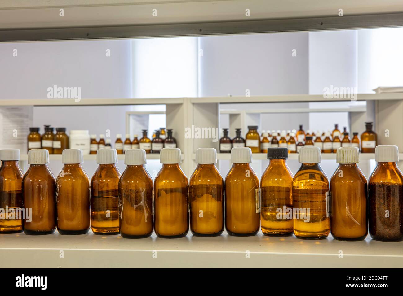 Close up amber color bottles in laboratory. Amber bottle for storing ...