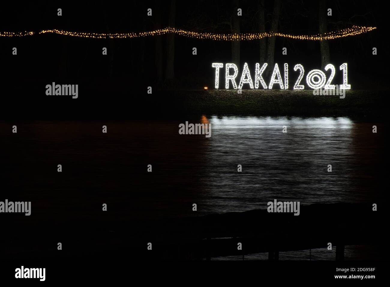 Logo of Trakai, Lithuanian capital of Culture 2021 with lights at night ...