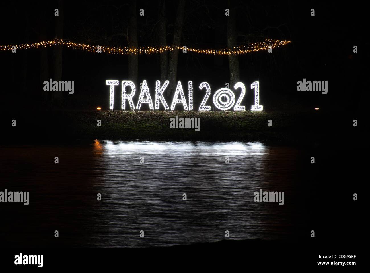 Logo of Trakai, Lithuanian capital of Culture 2021 with lights at night ...