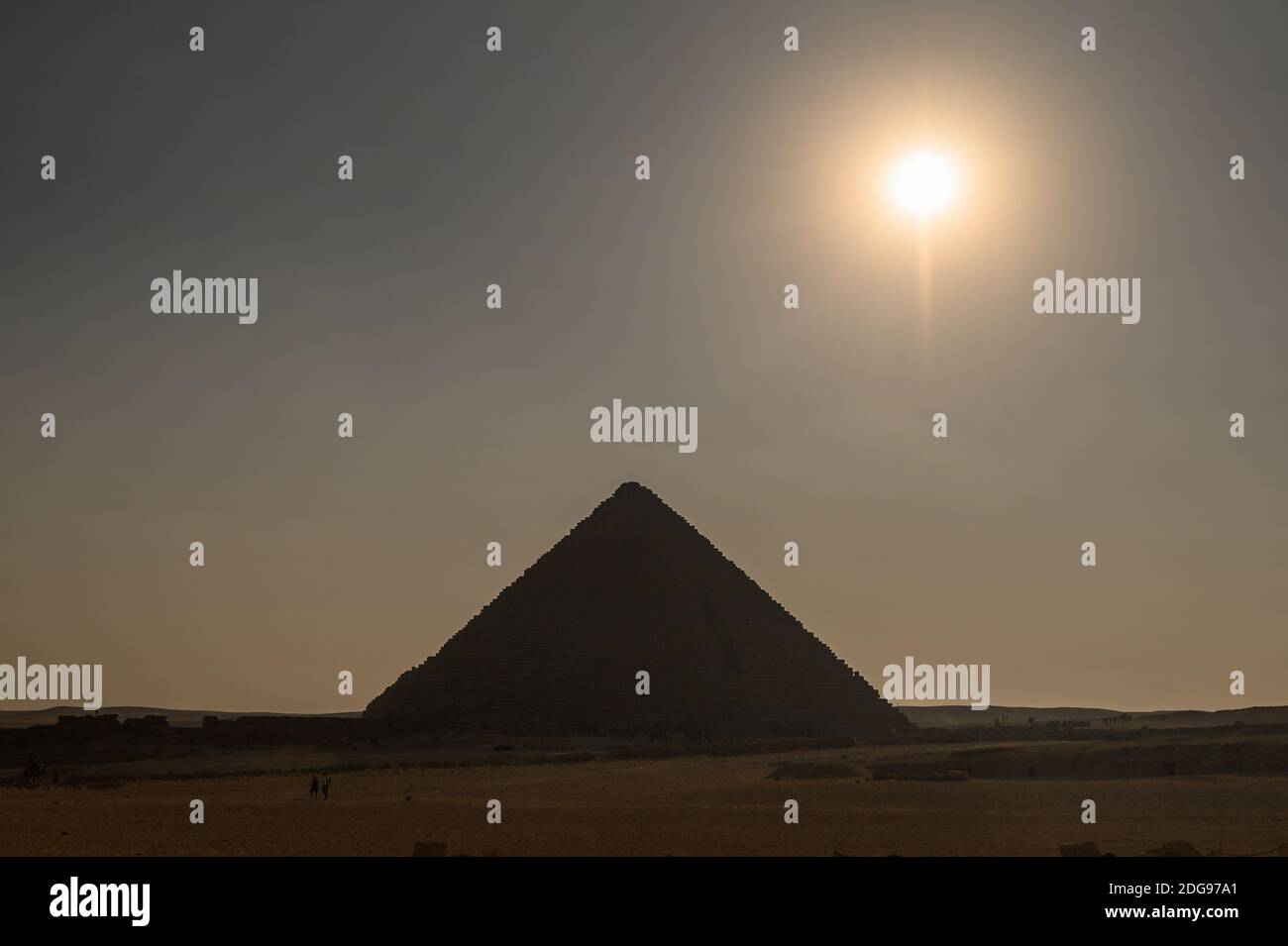 Sun setting over Great Pyramid of Khufu at Giza Pyramid Complex, Giza ...