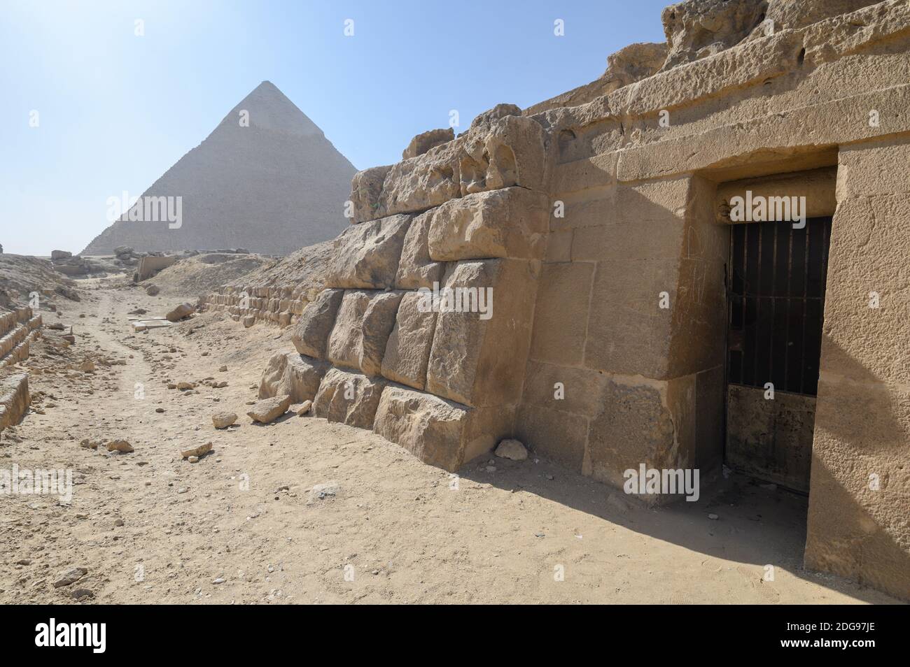 Entrance to tomb with Pyramid of Khafre in distance in Western Cemetery ...