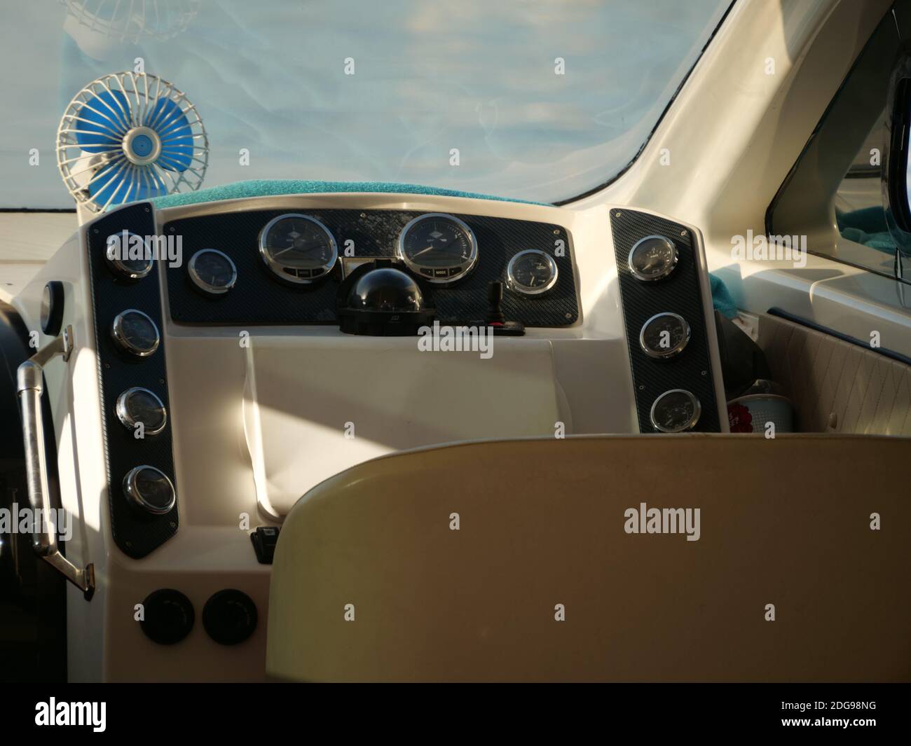 The dashboard of a boat with speed dials Stock Photo - Alamy