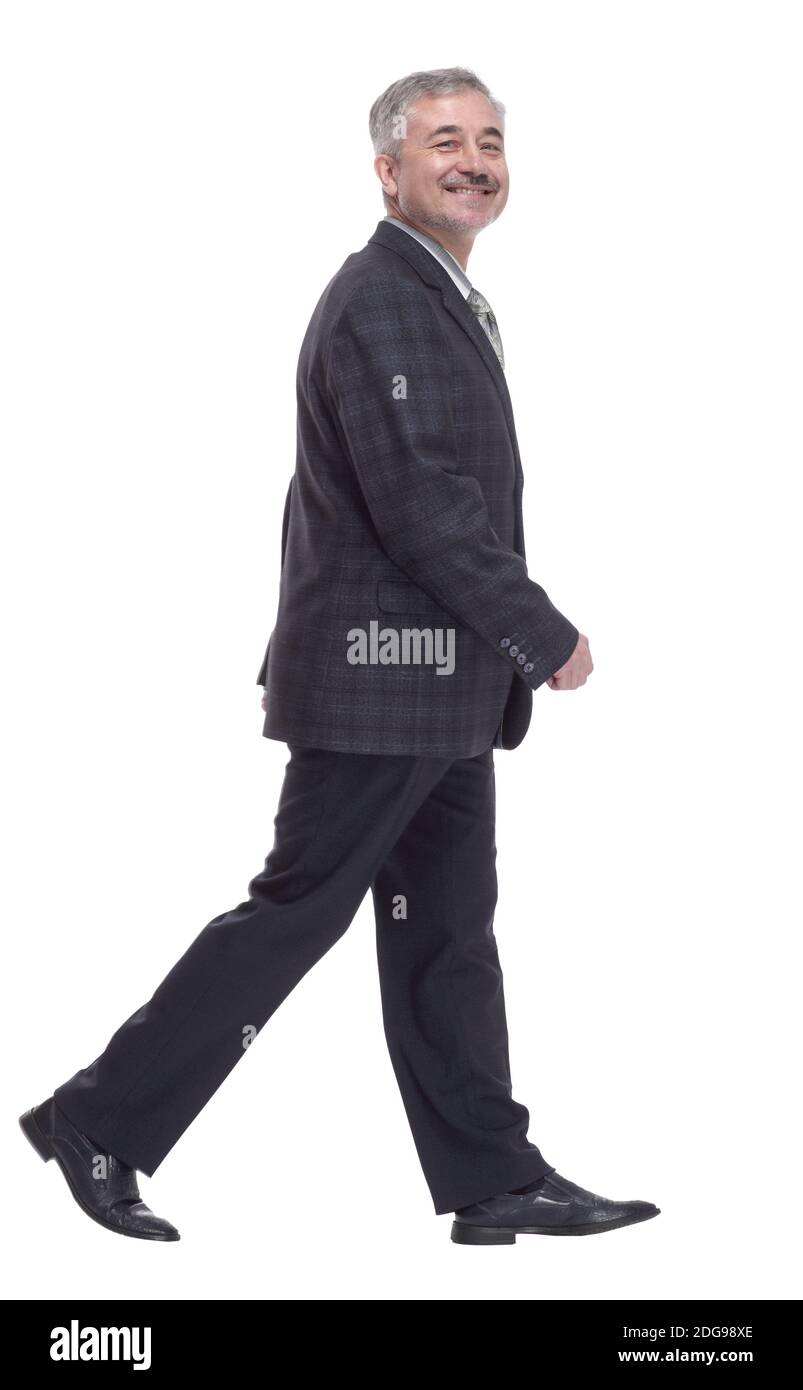 confident adult male striding forward . isolated on a white Stock Photo ...