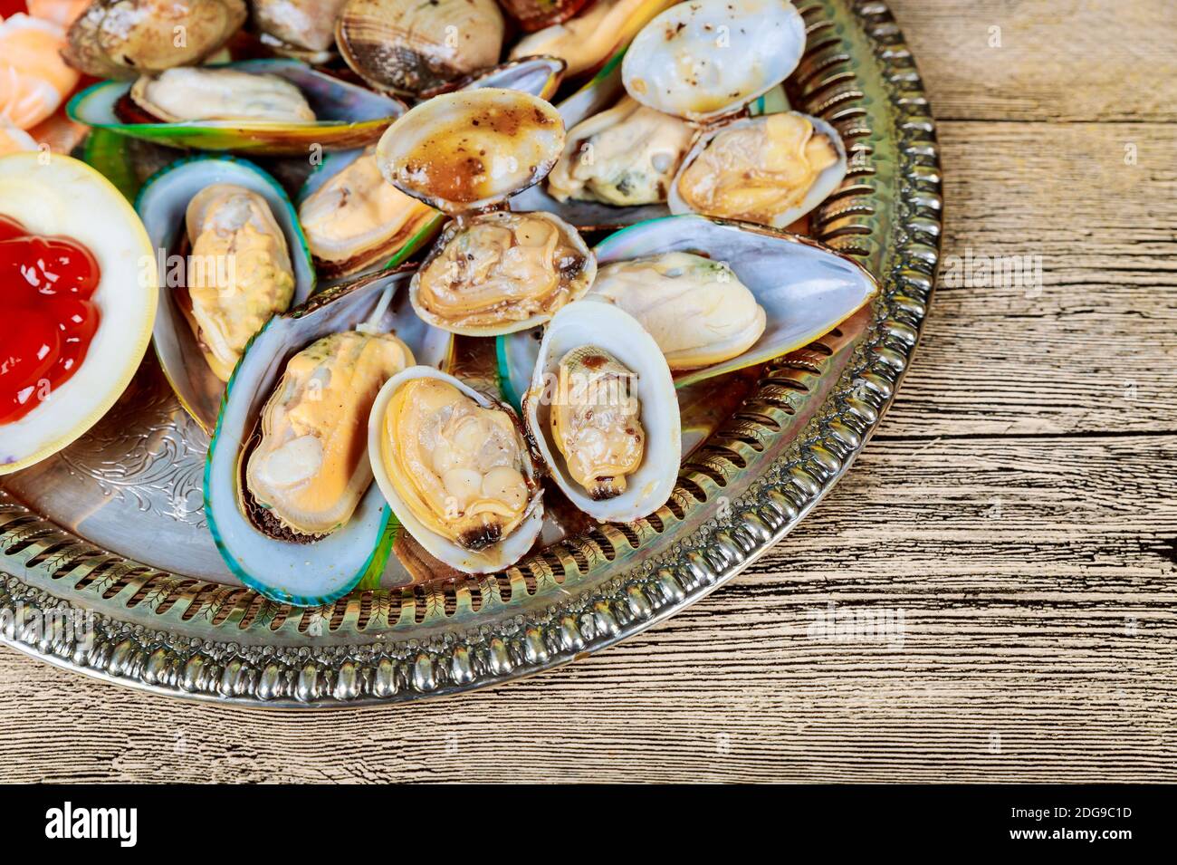 Tray of steamed mix seafood in, shrimp, shell and whelk , ready for eat ...