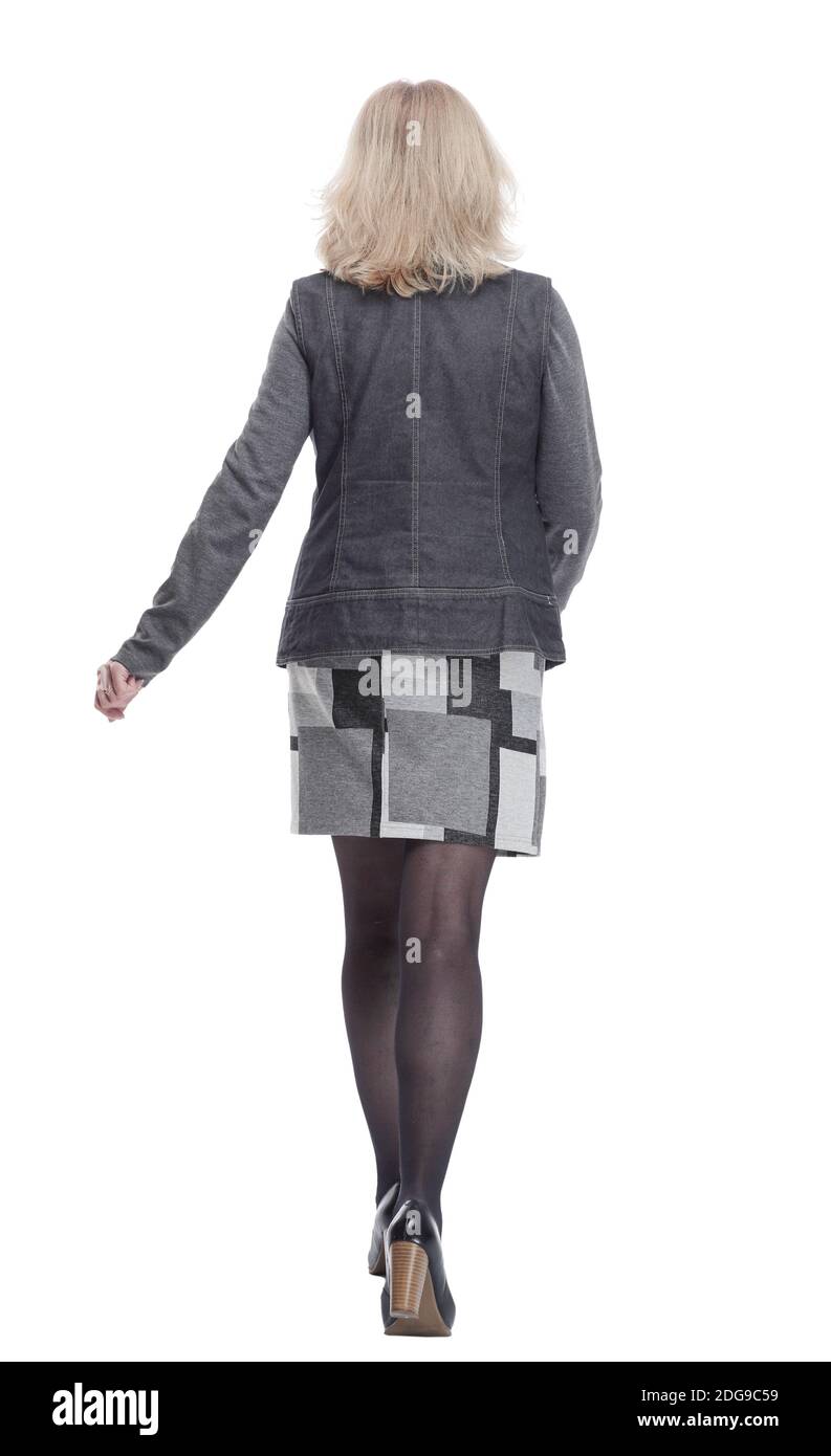 young woman walking away. isolated on a white Stock Photo - Alamy