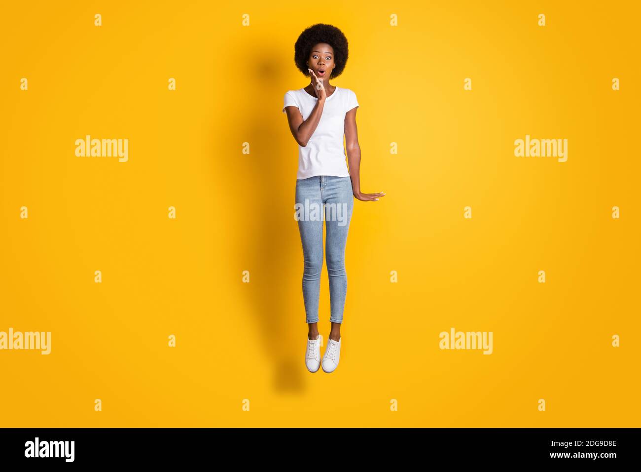Full length body size photo of amazed surprised girl with black skin ...