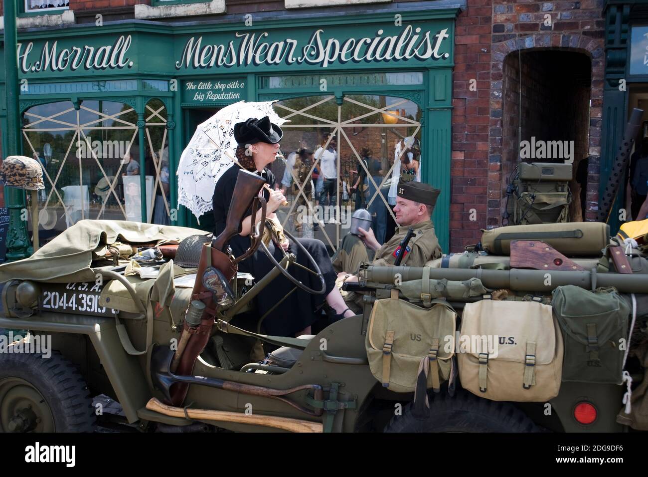 American Marine & His Girl In a Willy's Jeep At A 1940's WW2 Reenactment Event At The Black ...