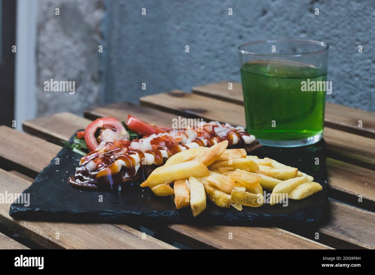 a mix of american fast food, junkie food. A fried meat like hamburger ...