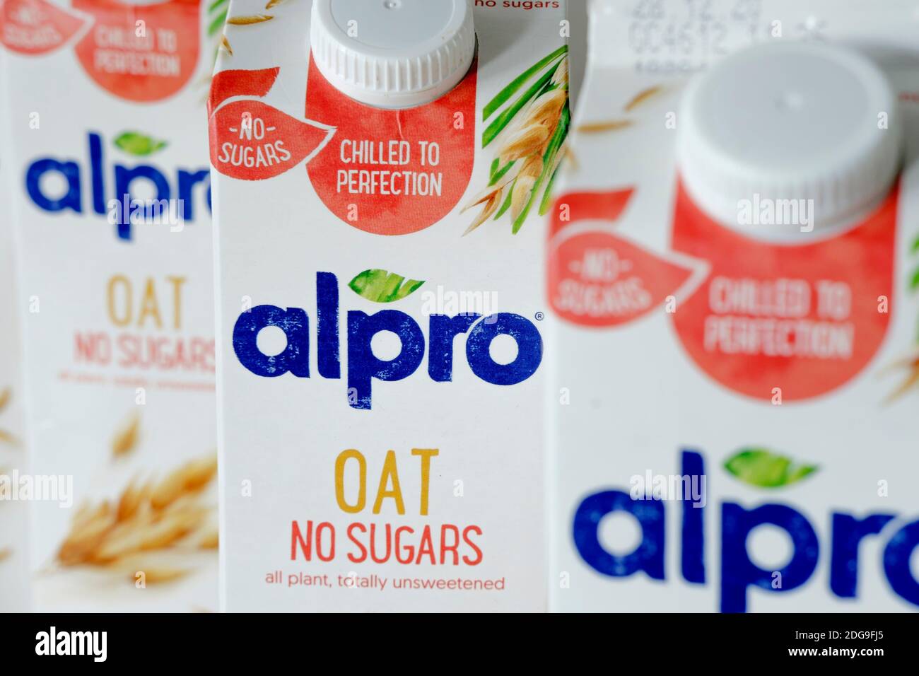 Cartons of alpro milk alternative oat drink Stock Photo - Alamy