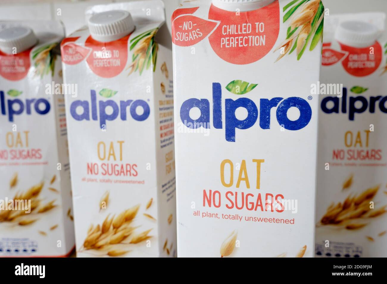 Cartons of alpro milk alternative oat drink Stock Photo - Alamy