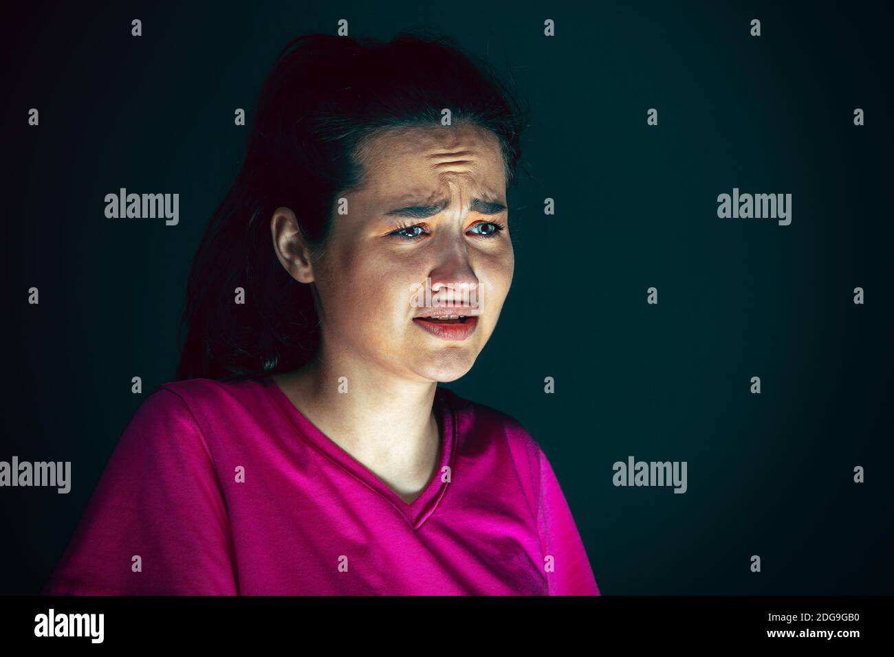 Crying. Portrait of young crazy scared and shocked caucasian woman ...