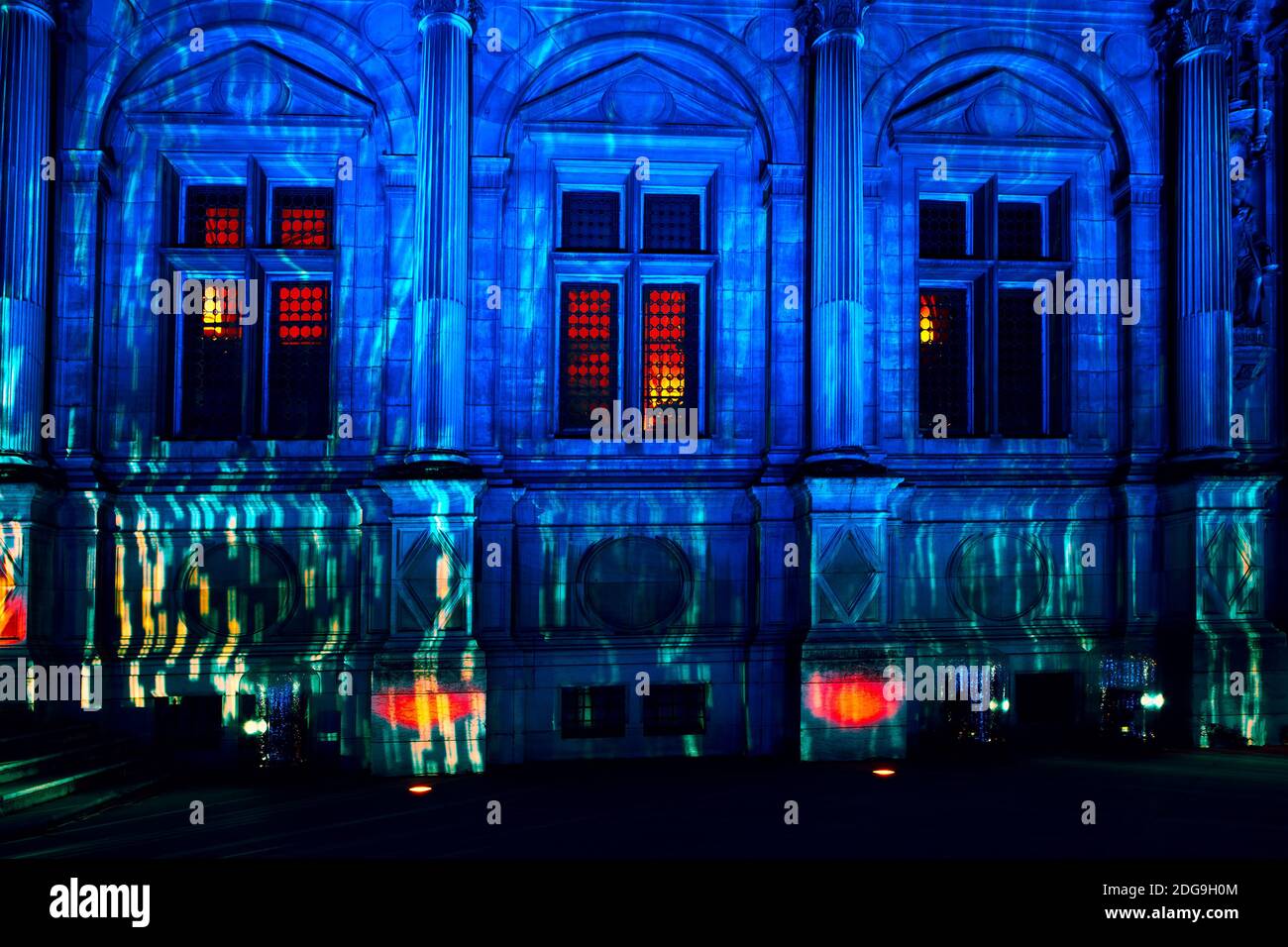 Illuminated building in blue light . Baroque building in the night ...