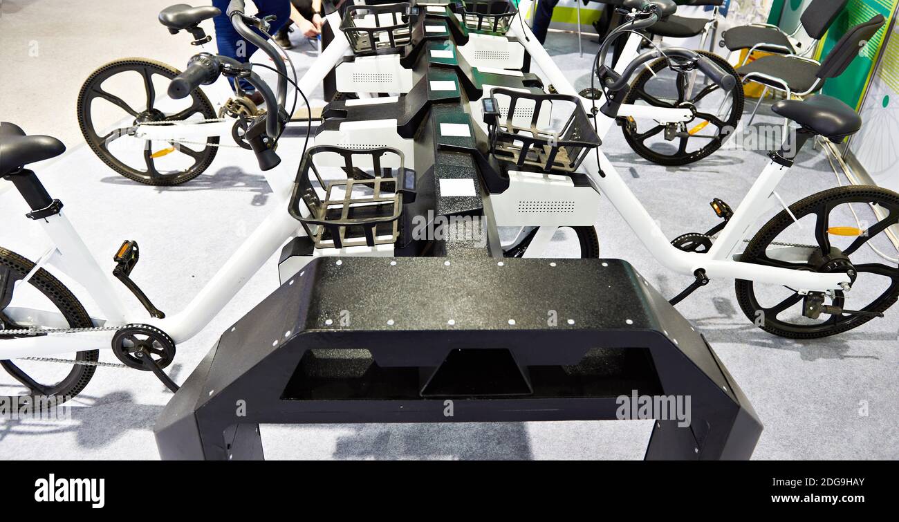 Electric bicycle rental equipment on exhibition Stock Photo - Alamy