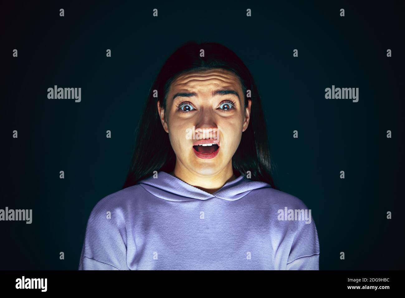 Extreme. Portrait of young crazy scared and shocked caucasian woman ...