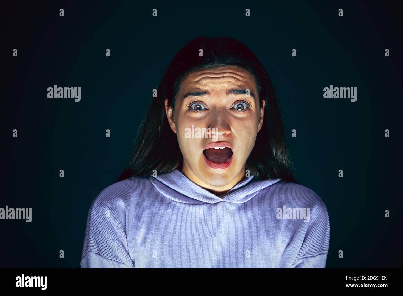 Extreme. Portrait of young crazy scared and shocked caucasian woman ...