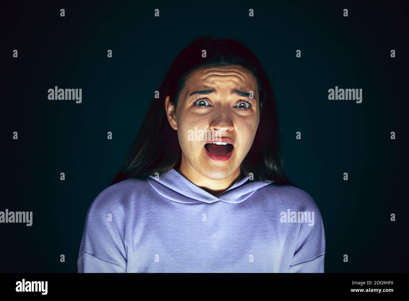 Extreme. Portrait of young crazy scared and shocked caucasian woman ...