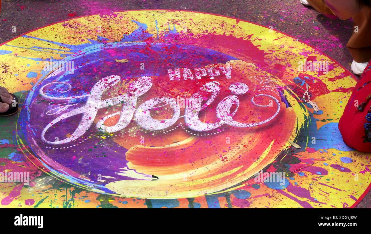 JAIPUR, INDIA - MARCH 21, 2019: close up of a colorful painted happy ...