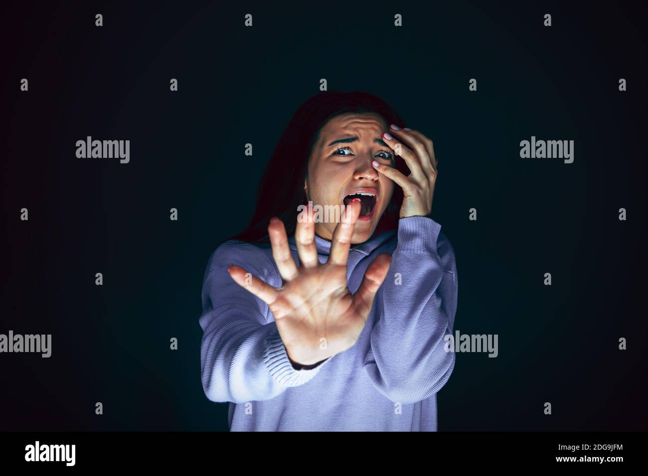 Ready to run. Portrait of young crazy scared and shocked caucasian ...