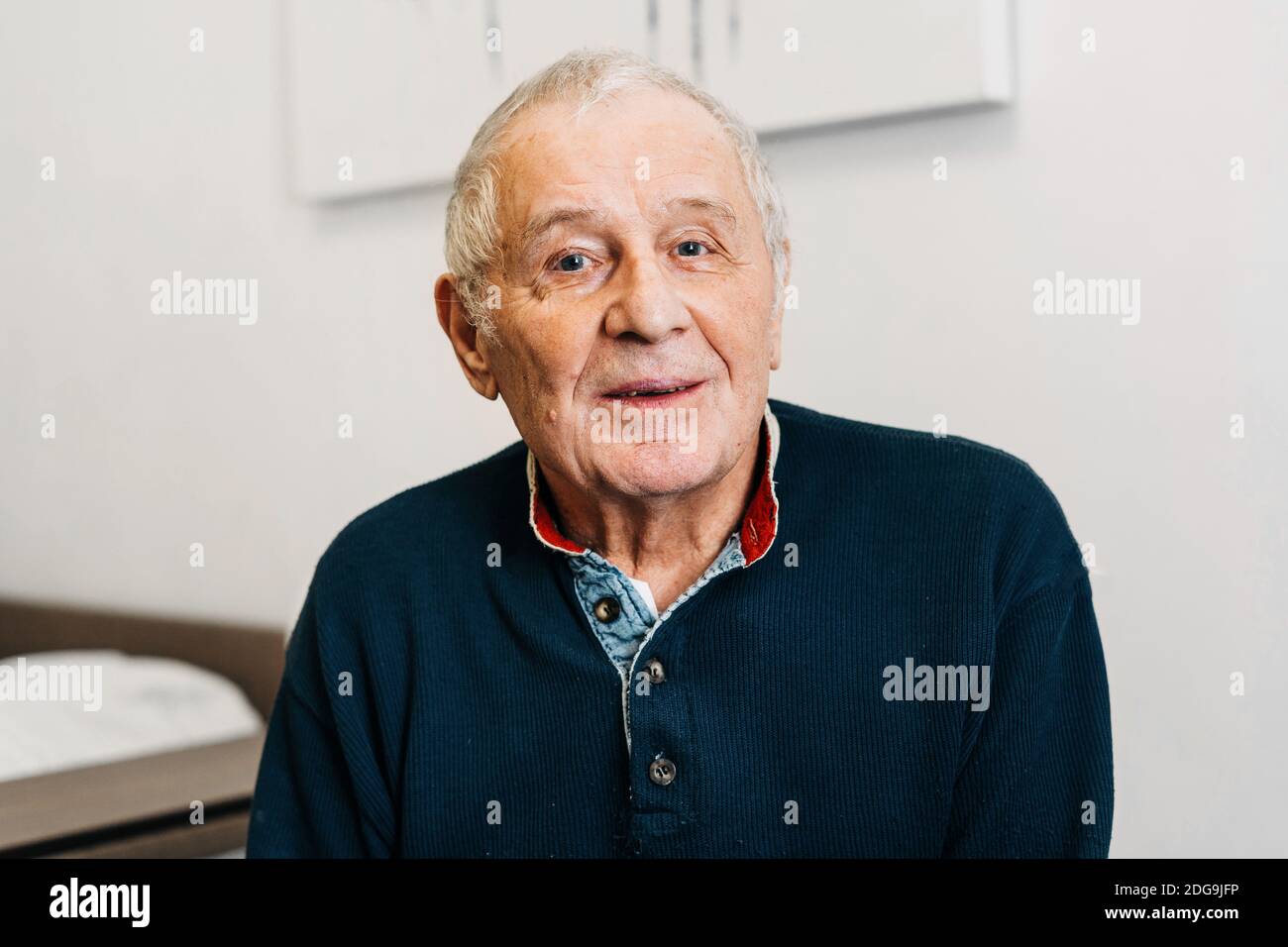 Portrait of caucasian elderly man at home Stock Photo - Alamy