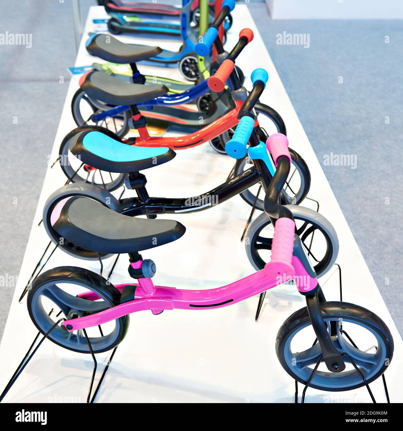 Colorful balance bicycle or run bike in store Stock Photo - Alamy