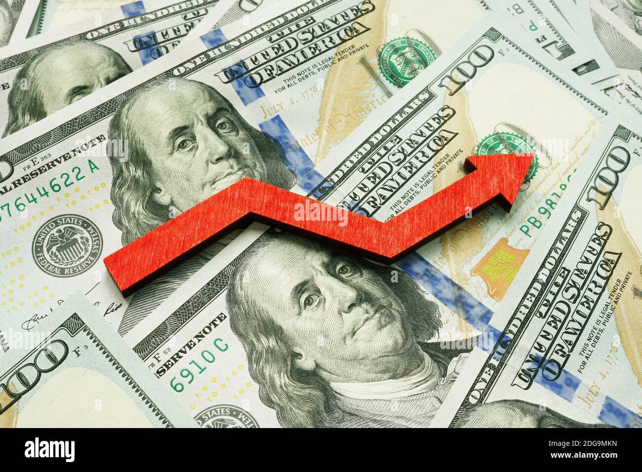 Profit and business growth concept. Stack of money and rising arrow ...