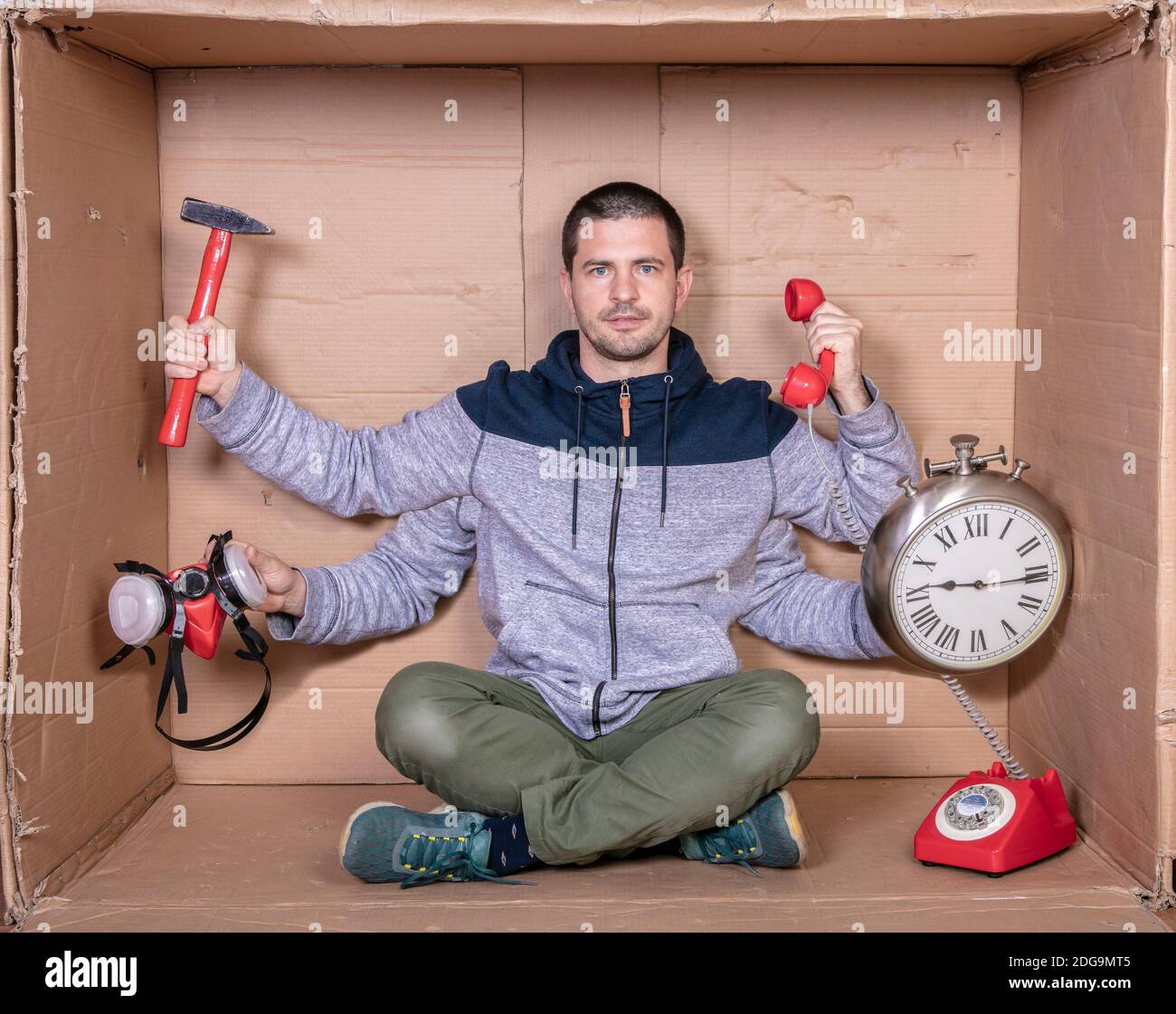 multi-tasking employee ready for any challenge Stock Photo - Alamy