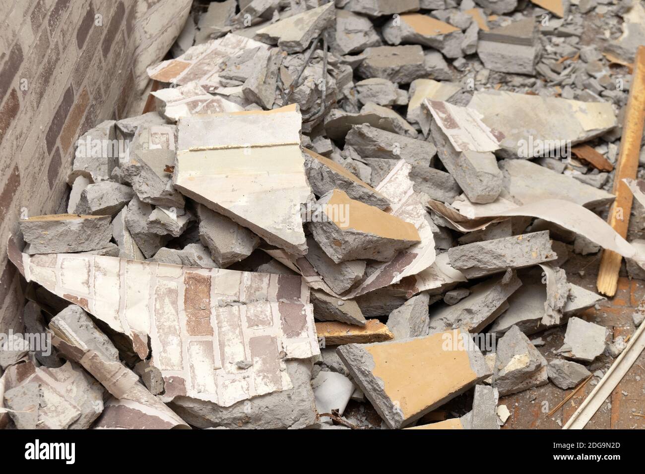 Pile of construction debris with pieces of cement, concrete and ...