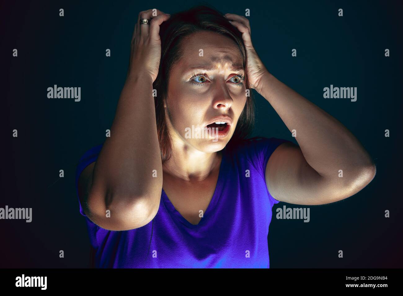 Spooky. Portrait of young crazy scared and shocked caucasian woman ...