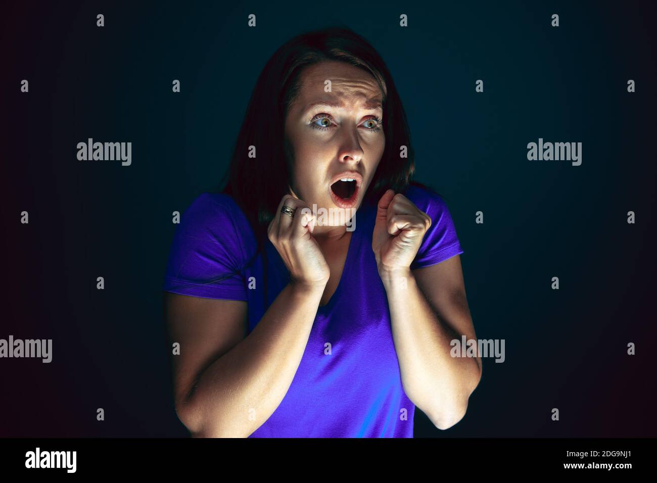Breathe. Portrait of young crazy scared and shocked caucasian woman ...