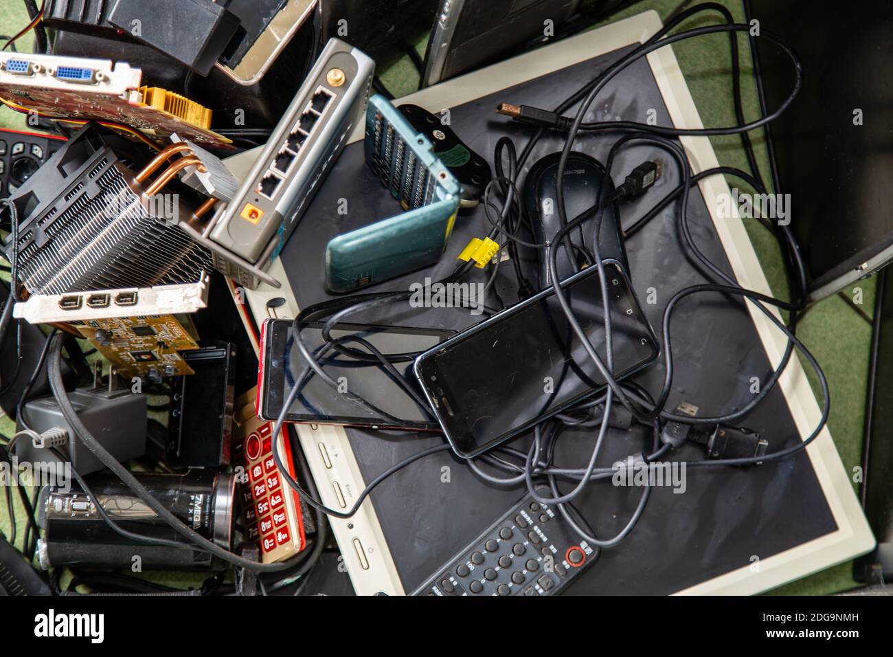 Pile of assorted electronic products e-waste Stock Photo - Alamy