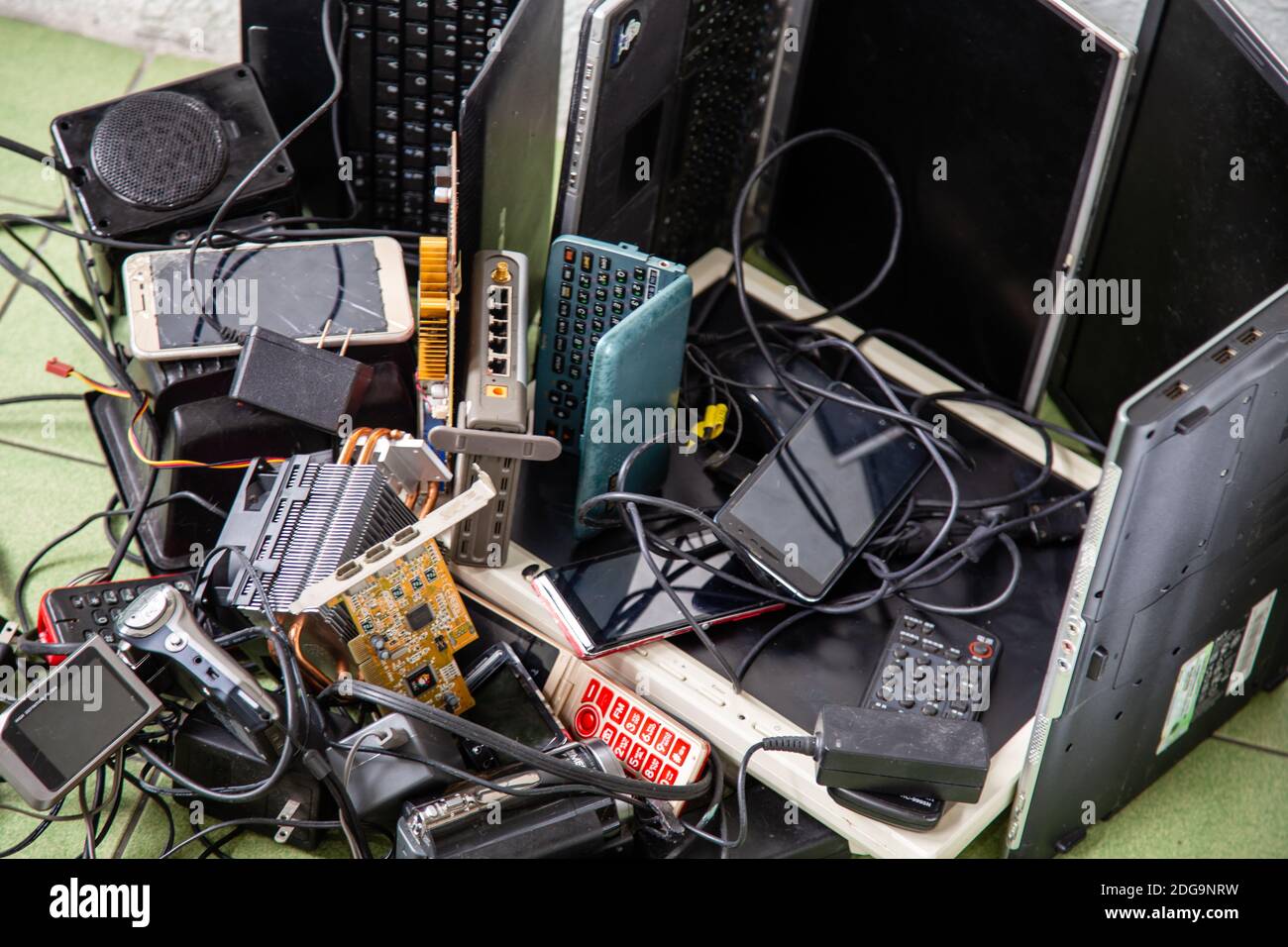Pile of assorted electronic products e-waste Stock Photo - Alamy
