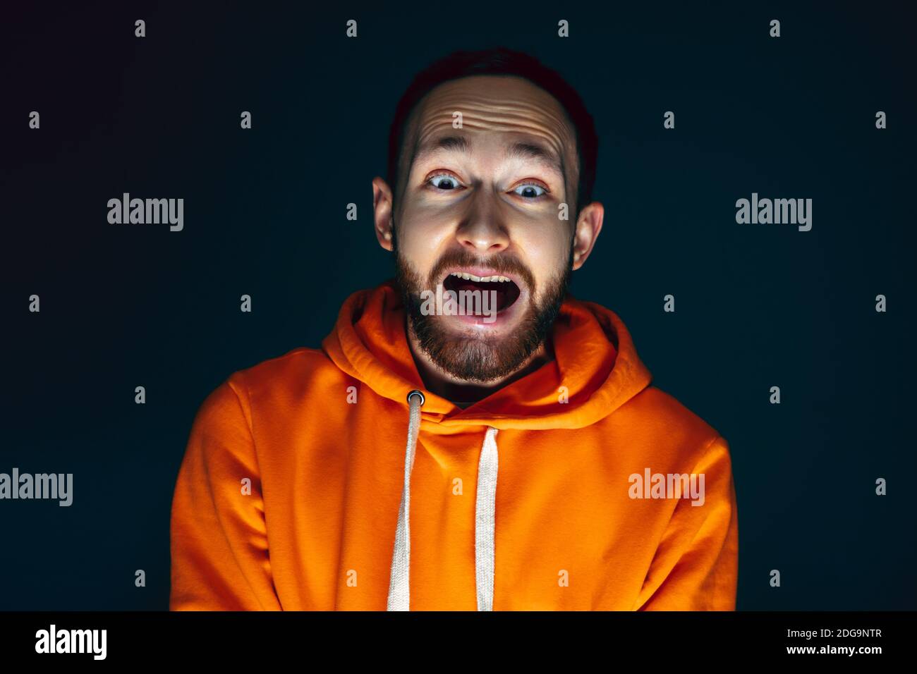 Screaming. Portrait of crazy scared and shocked caucasian man isolated ...