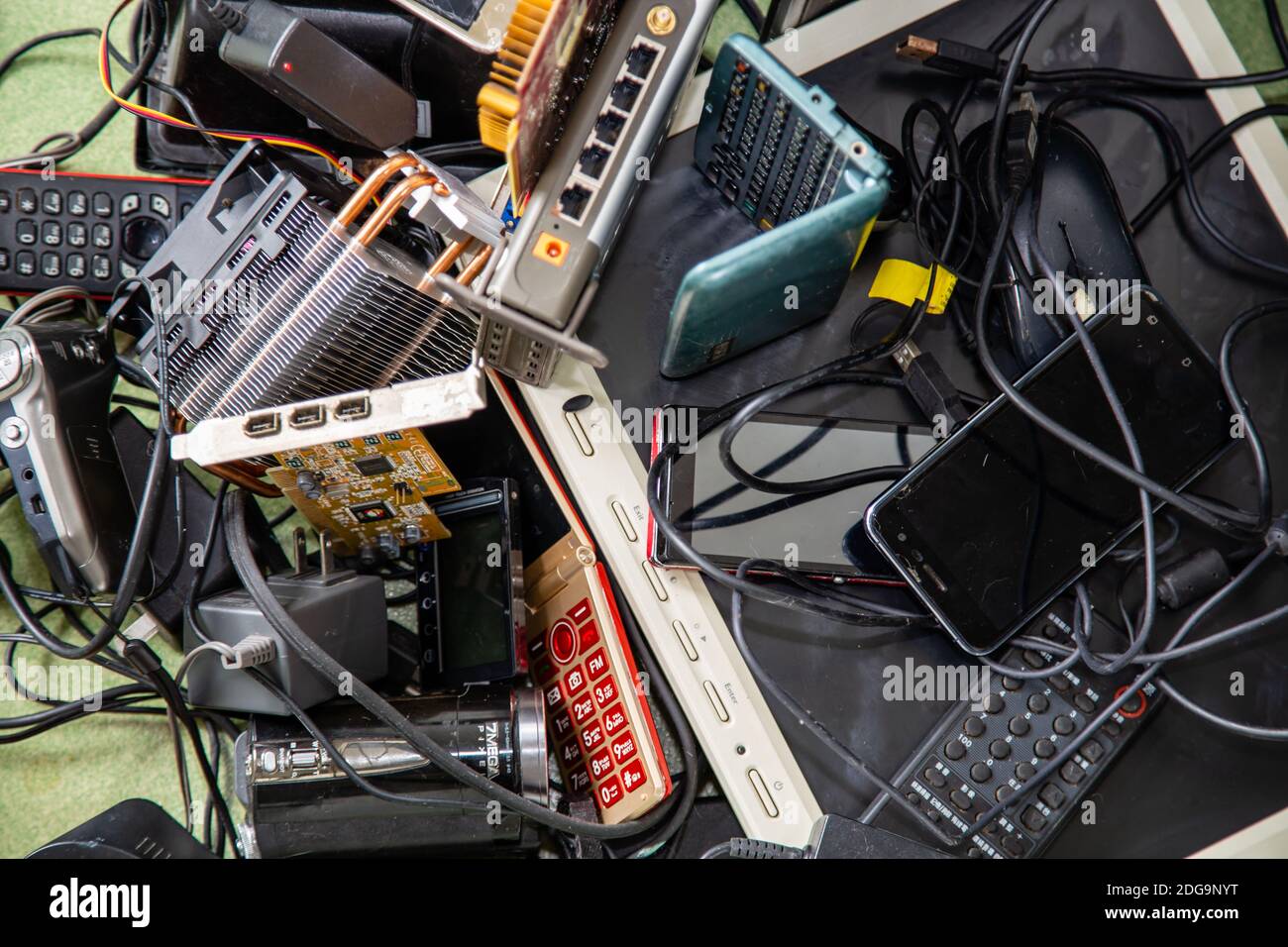 Pile of assorted electronic products e-waste Stock Photo - Alamy
