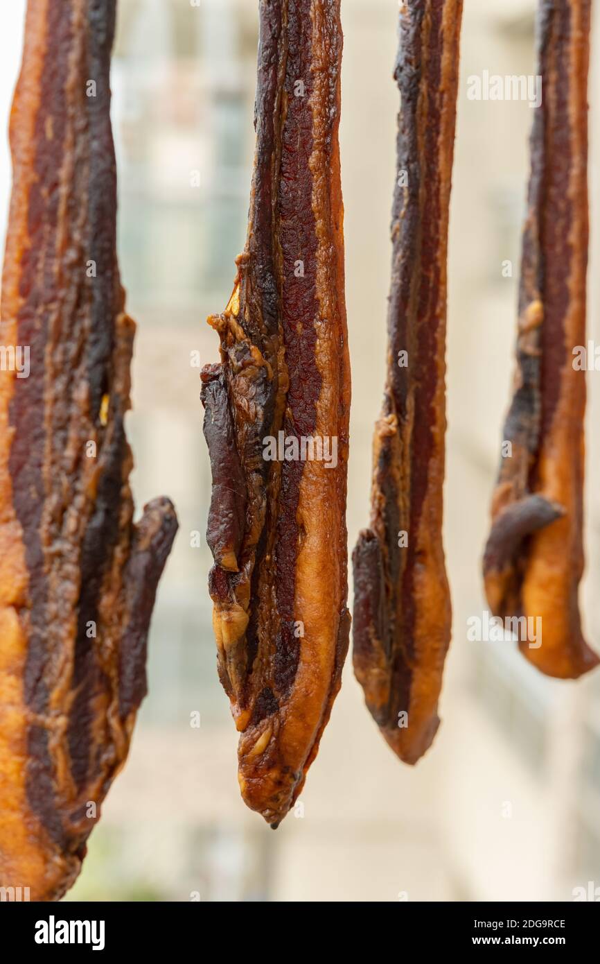 making air-dried bacon in a balcony vertical composition Stock Photo ...