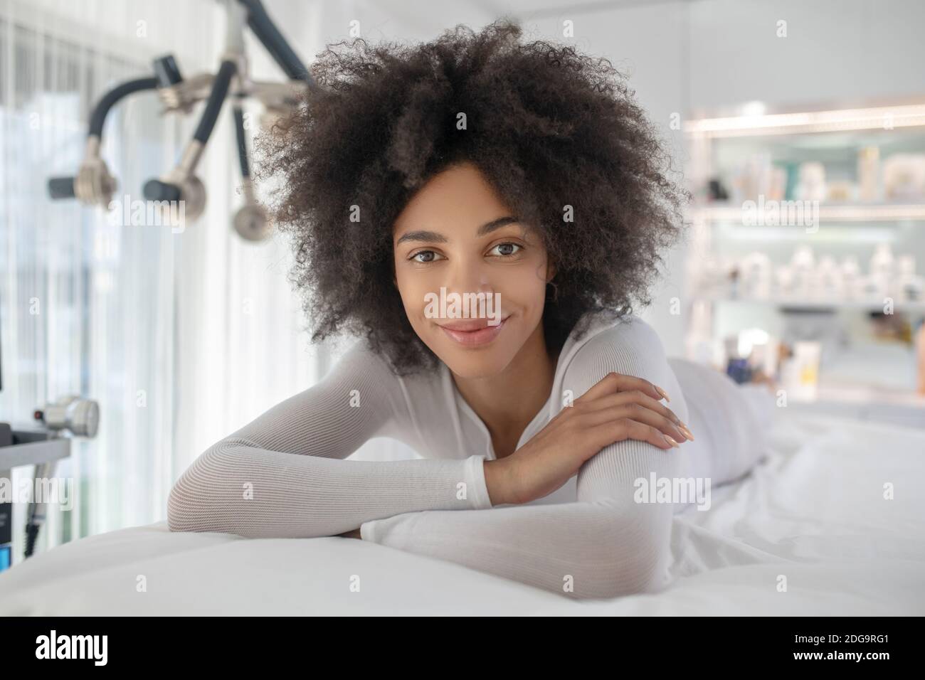 Cute young girl having rest in beauty parlor Stock Photo - Alamy