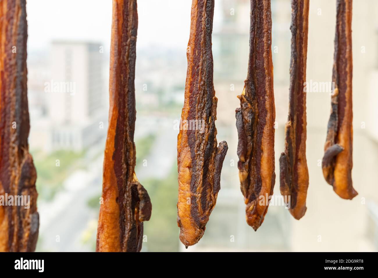 making air-dried bacon in a balcony horizontal composition Stock Photo ...