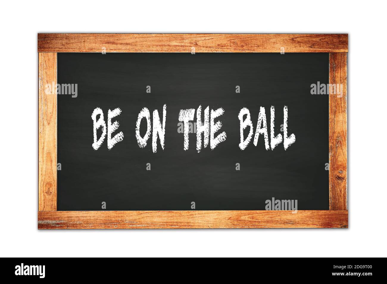 BE ON THE BALL text written on black wooden frame school blackboard ...