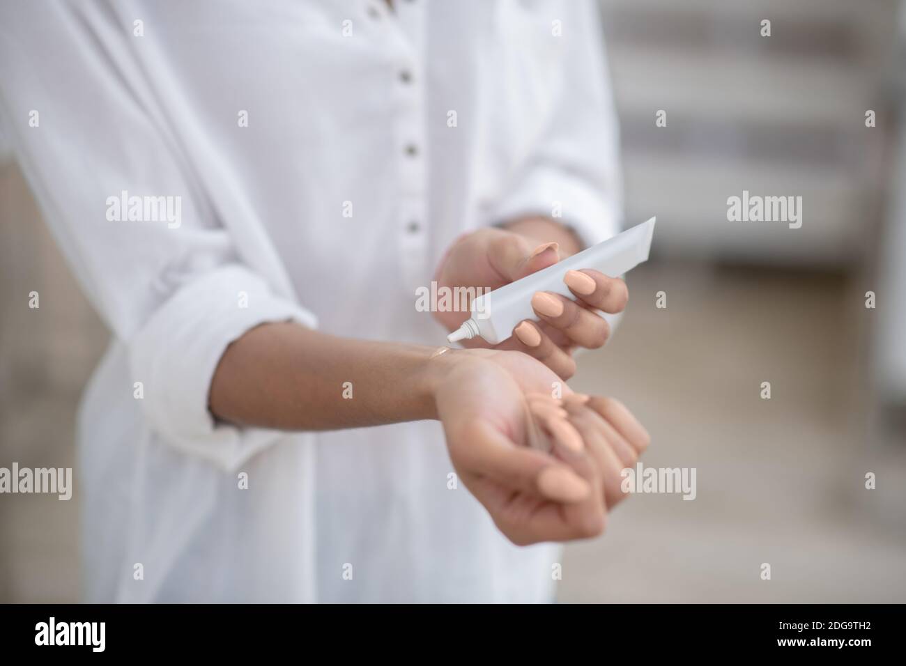 Female thin hands testing cosmetic cream Stock Photo - Alamy