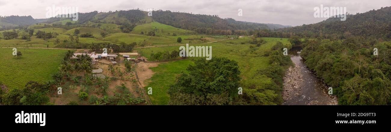 Aerial panorama with Rio Achiote and rainforest at right near Puerto ...
