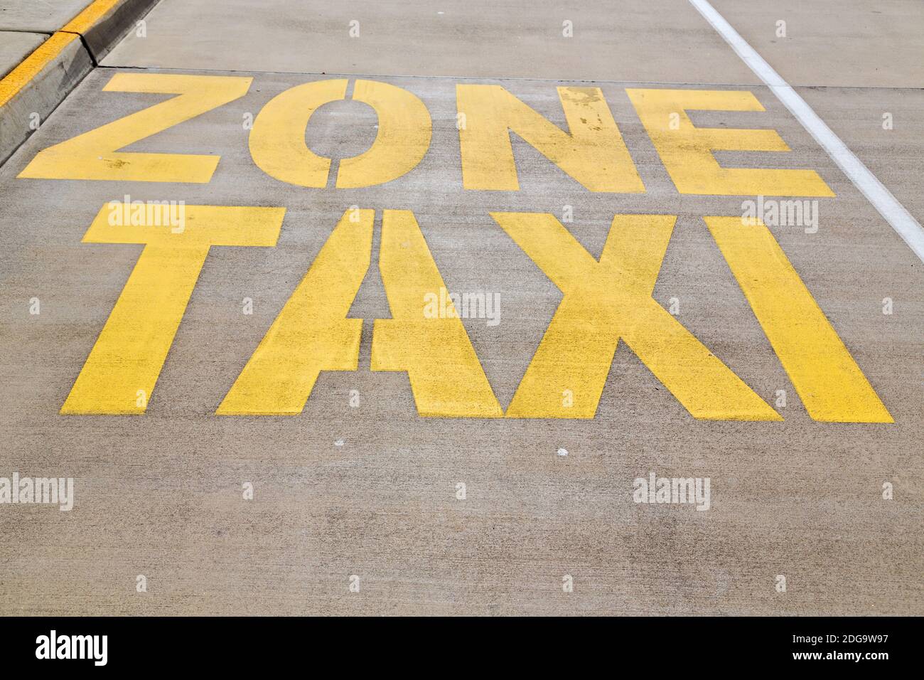The line painted in the asphalt for taxy zone Stock Photo - Alamy