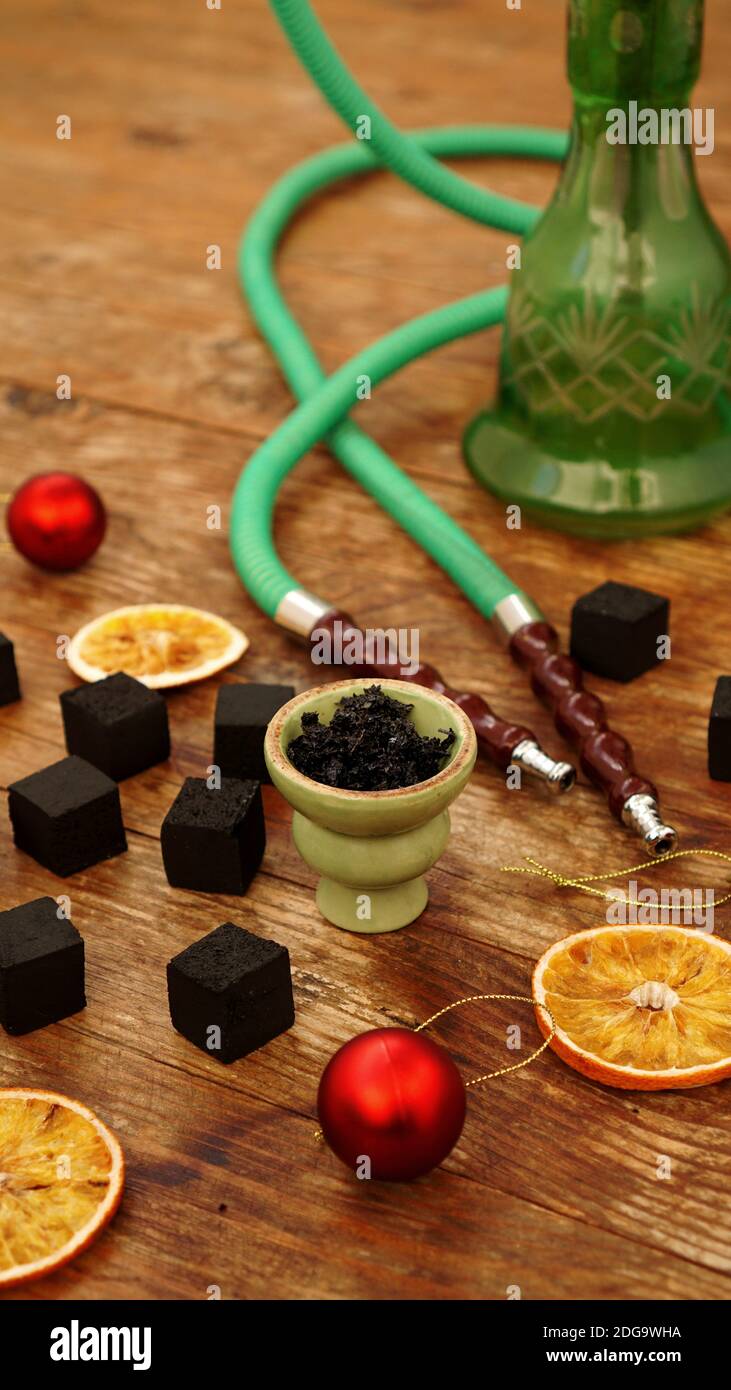 Hookah background for new year and christmas. Hookah, charcoal, dry ...