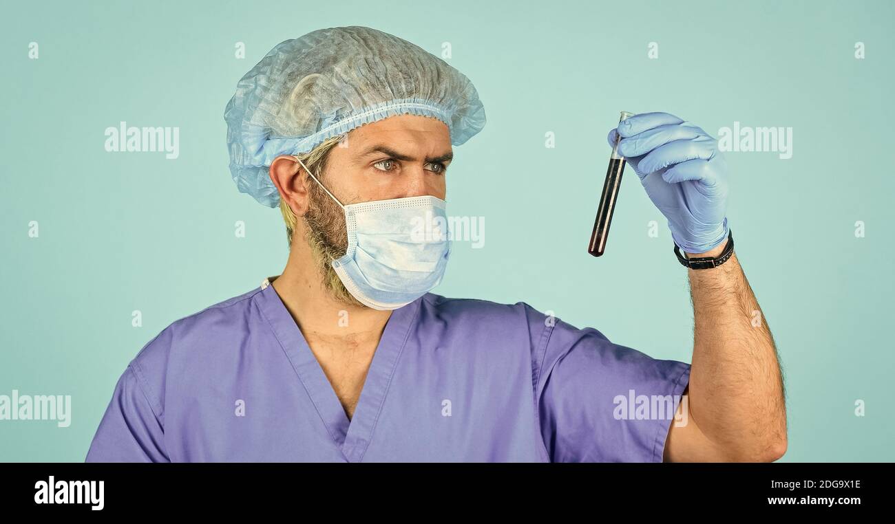 epidemy health danger. doctor in respirator mask. nurse look at test ...