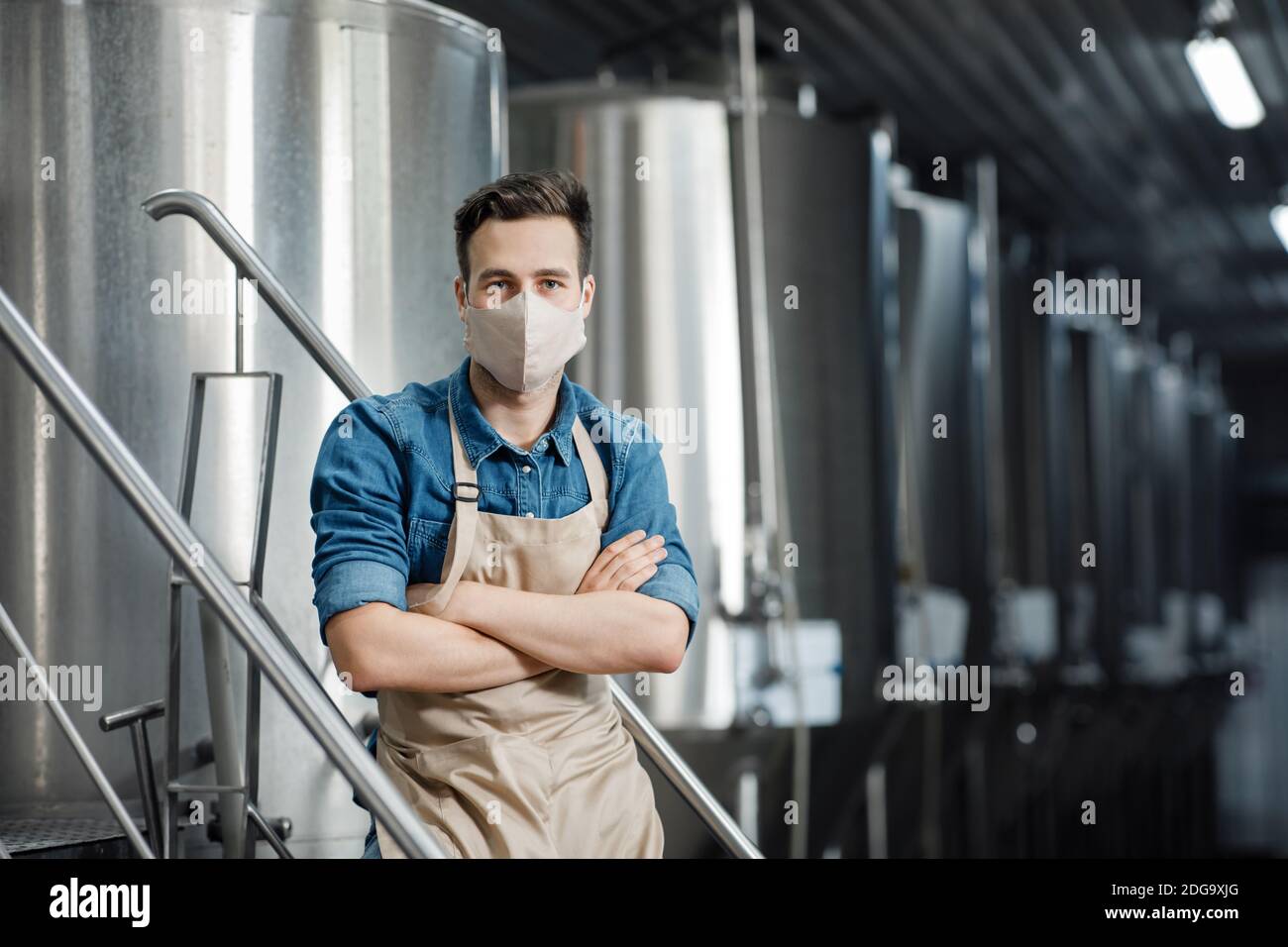 Worker stands near tanks hi-res stock photography and images - Alamy