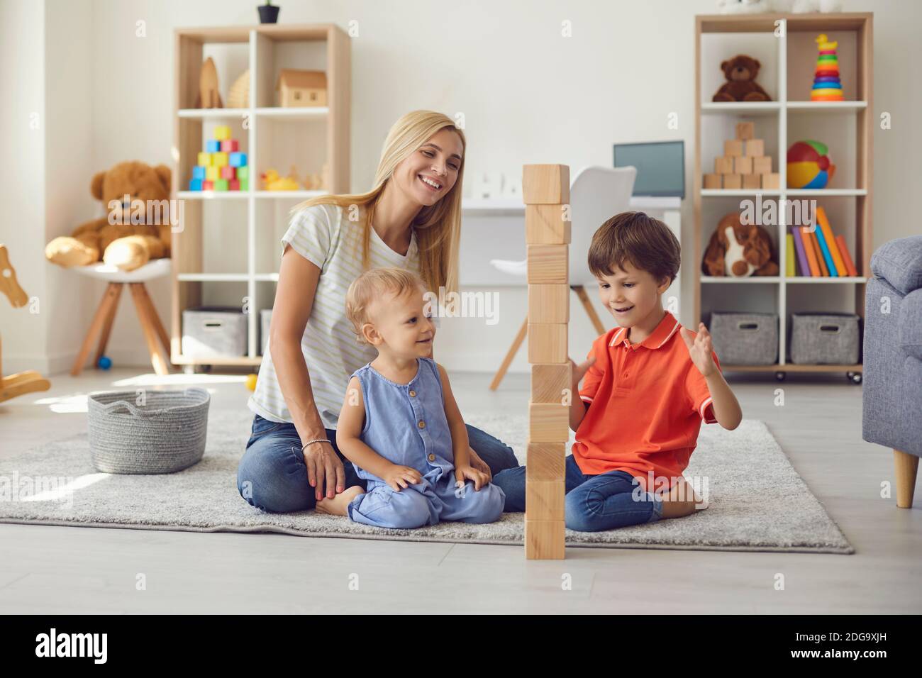 Block tower building children hi-res stock photography and images - Alamy