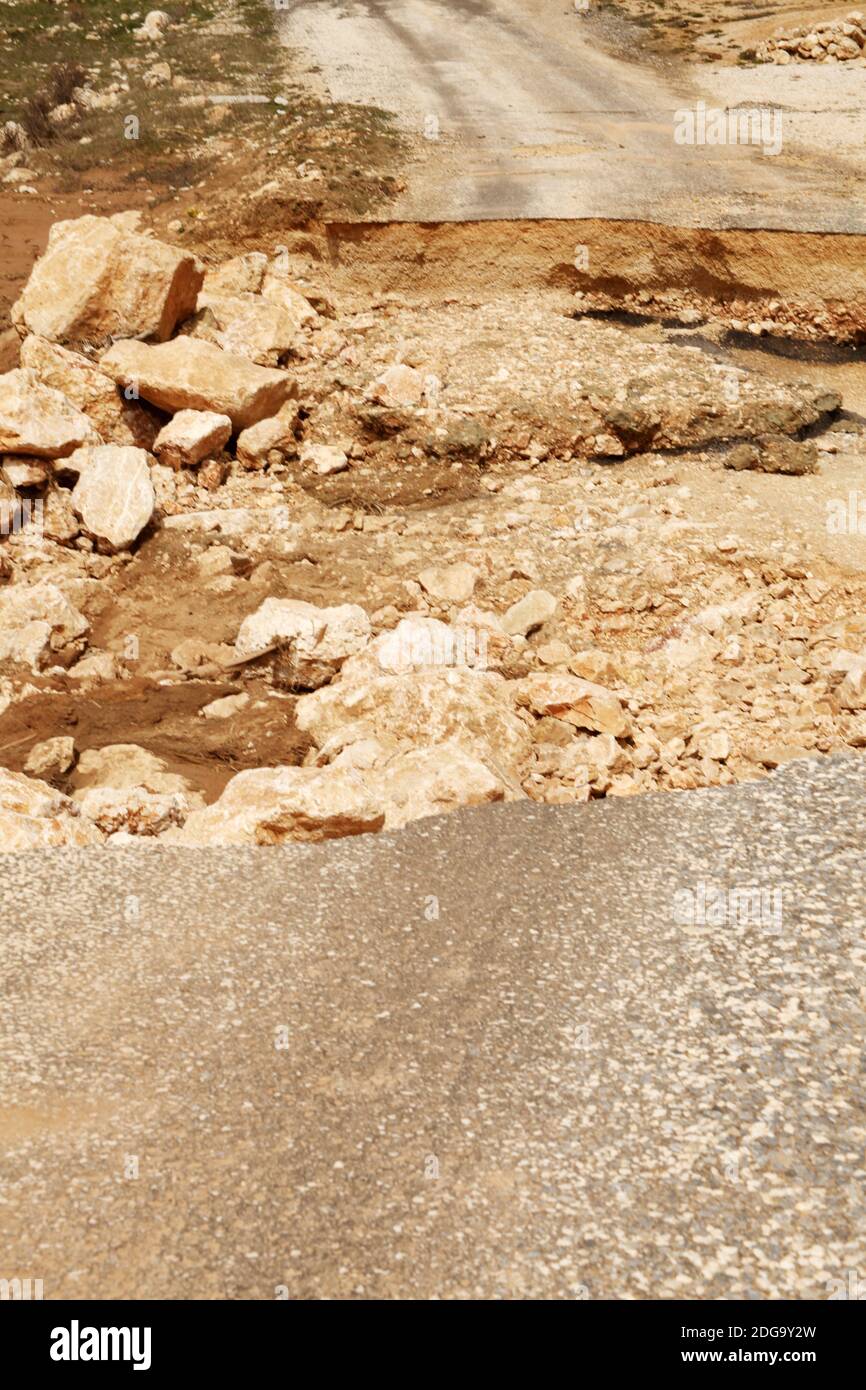 Damaged mountain asphalt road. Country road Stock Photo - Alamy