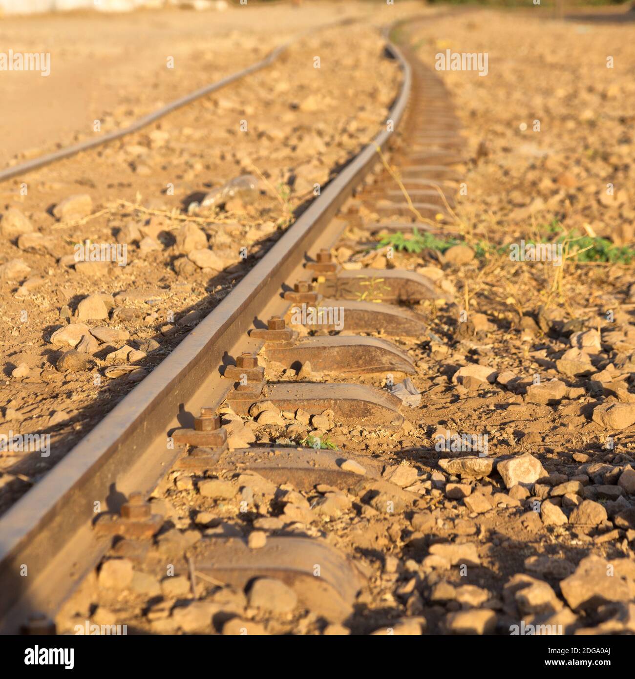 In the light of sunrise the railway road Stock Photo - Alamy