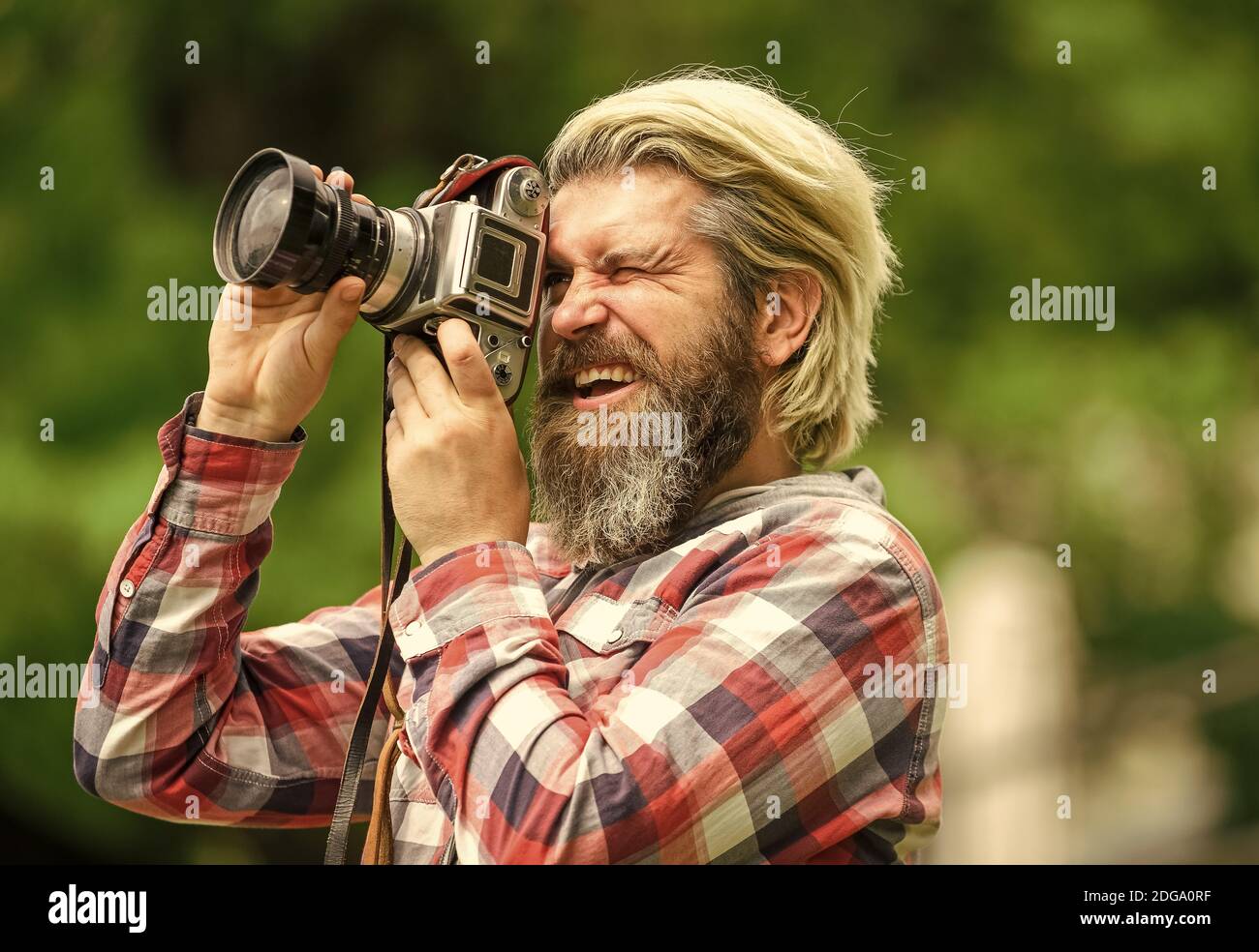 Man bearded hipster photographer hold vintage camera. Man with beard ...