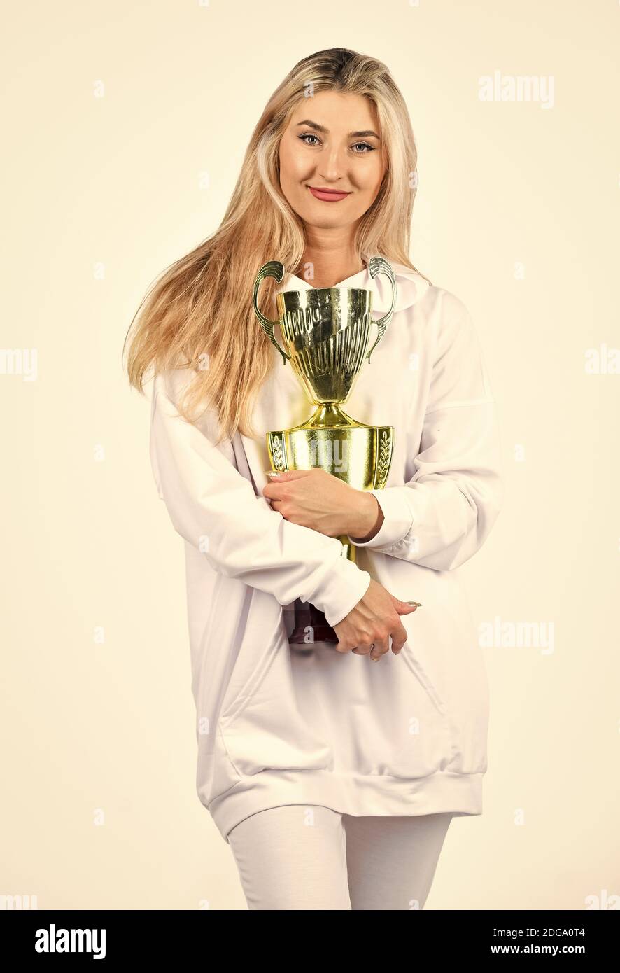 Girl showing winning trophy hi-res stock photography and images - Alamy