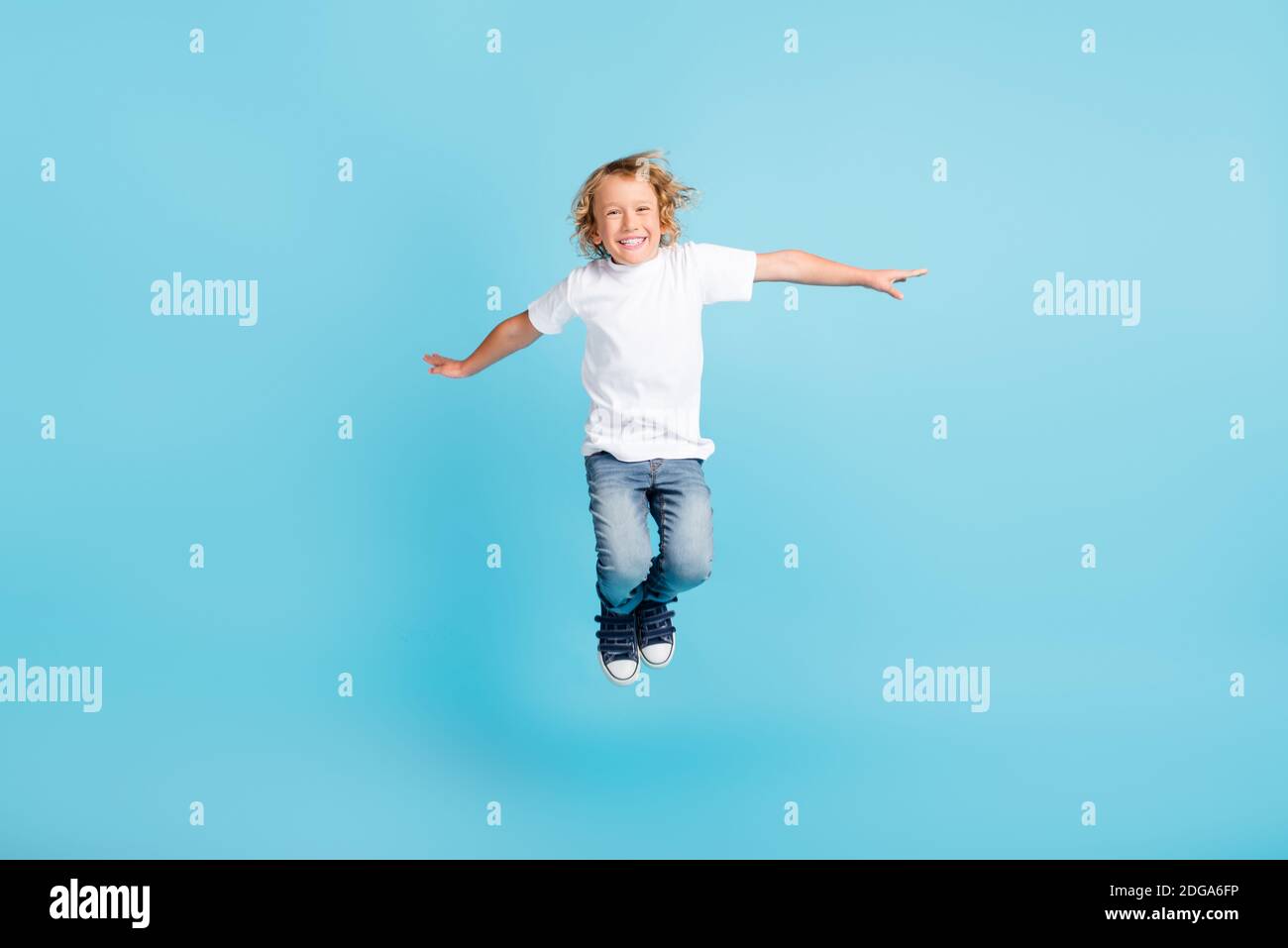 Child jump isolated legs up hi-res stock photography and images - Alamy